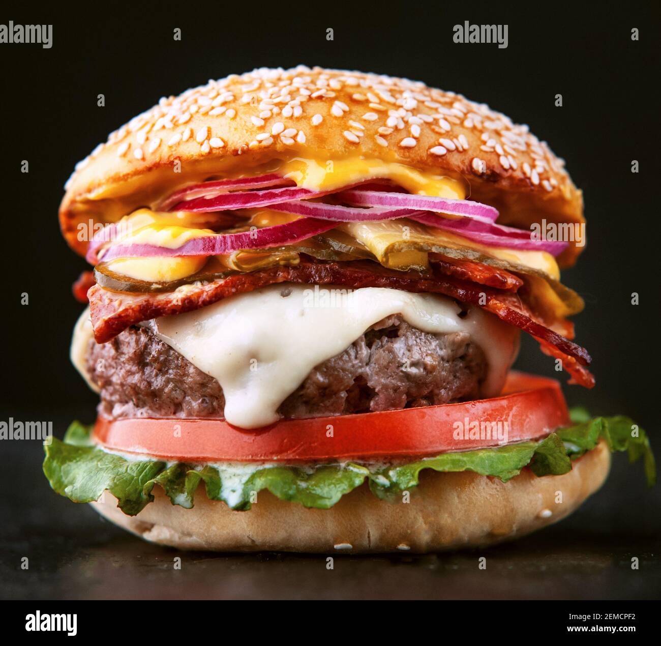 Delicious fresh homemade burger on a wooden table Stock Photo - Alamy