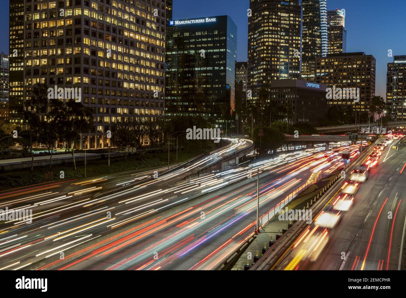 A view of downtown Los Angeles and traffic on the 110 Freeway in Los ...