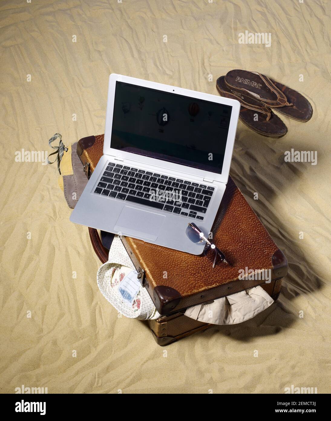 Travelling with a laptop computer Stock Photo - Alamy