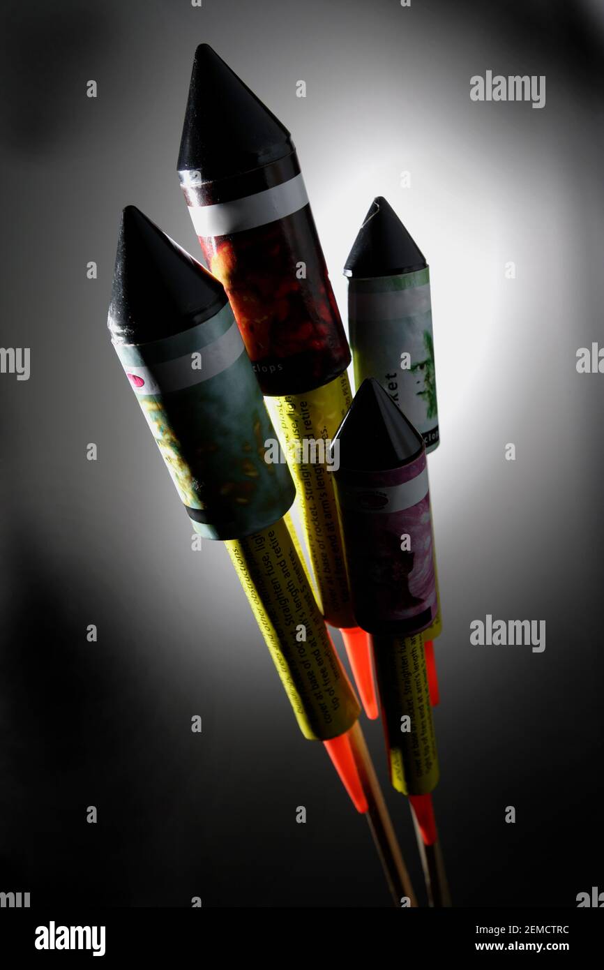 Rockets on sticks. 4 firework rockets as a group Stock Photo - Alamy
