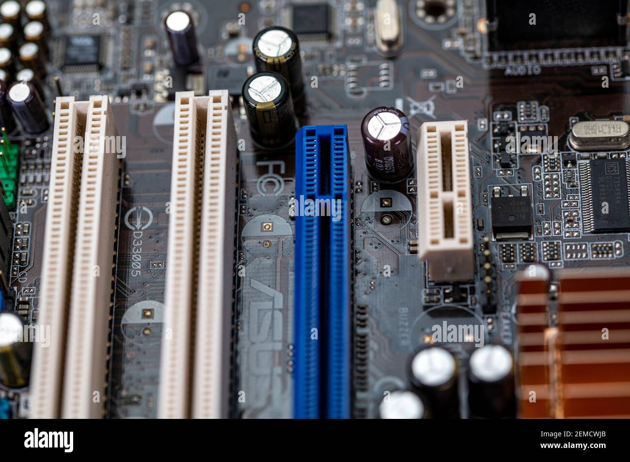 detail of a motherboard with connectors and heatsinks of a fixed ...