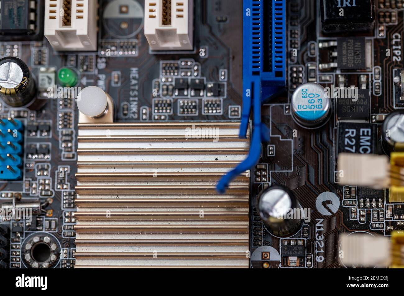 detail of a motherboard with connectors and heatsinks of a fixed ...