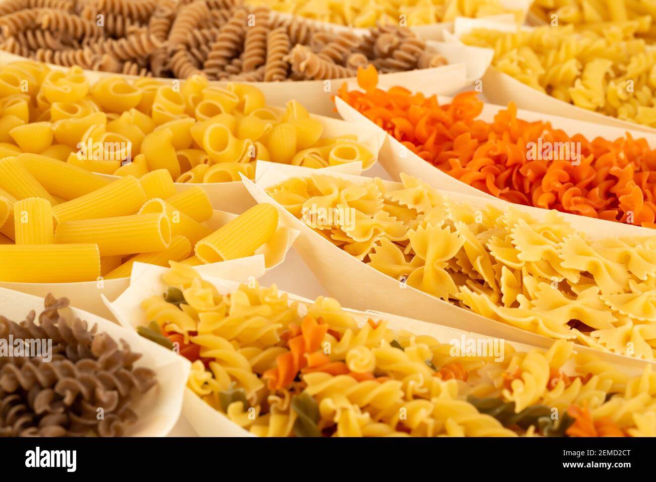 Various kind of Italian pasta in the bamboo bowls Stock Photo - Alamy