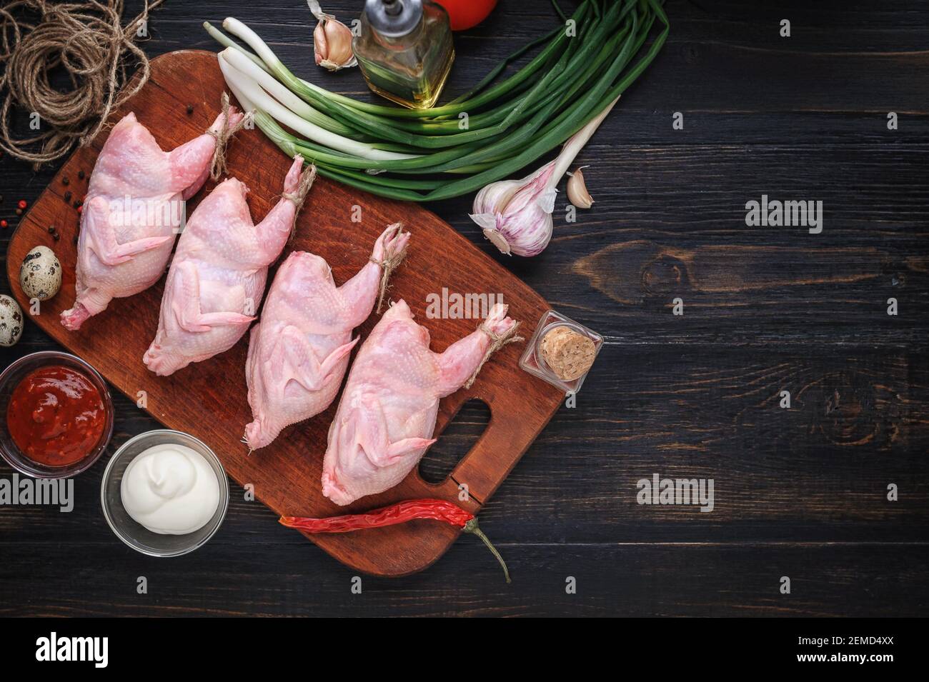 Homemade eco-friendly raw quails ready for cooking Stock Photo - Alamy