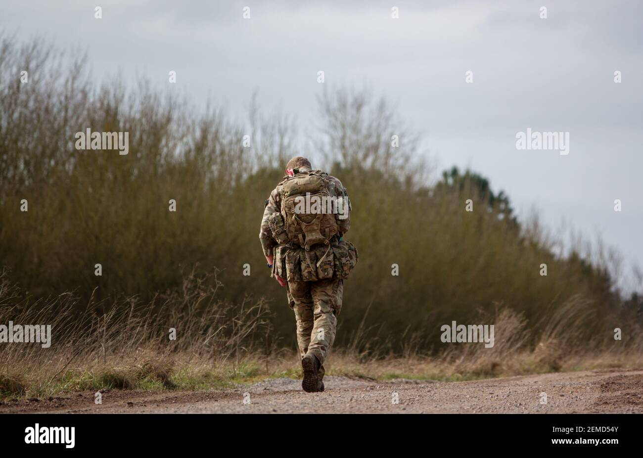 British army soldier completing an 8 mile combat training test tabbing ...