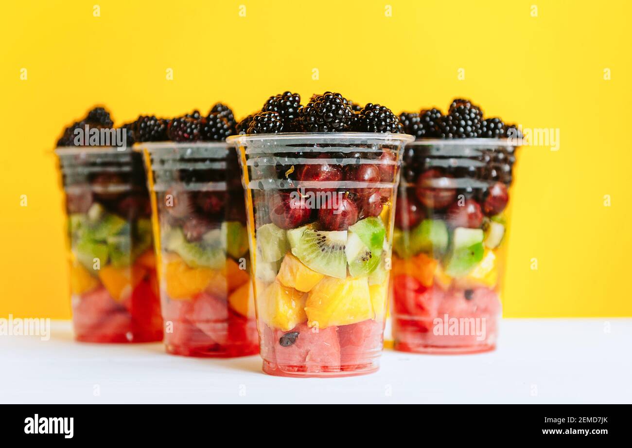 Fruit in a plastic cup Stock Photo - Alamy