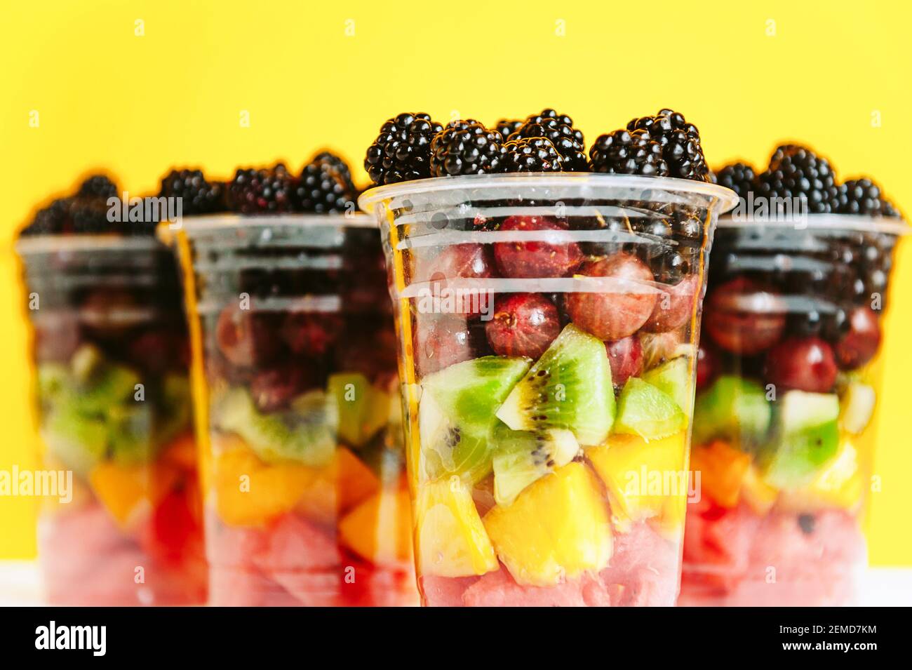 Fruit in a plastic cup Stock Photo - Alamy
