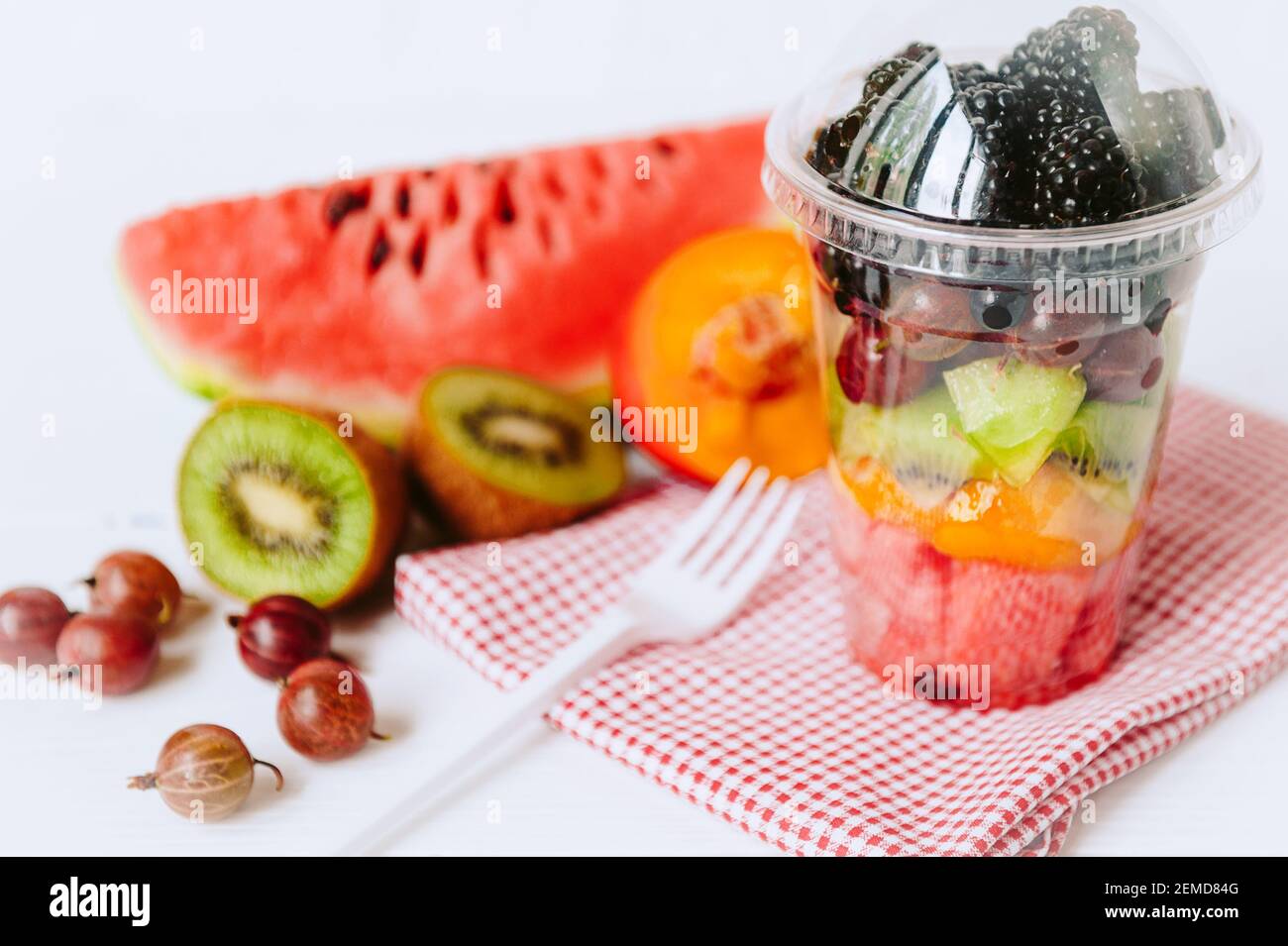 Fruit in a plastic cup Stock Photo - Alamy