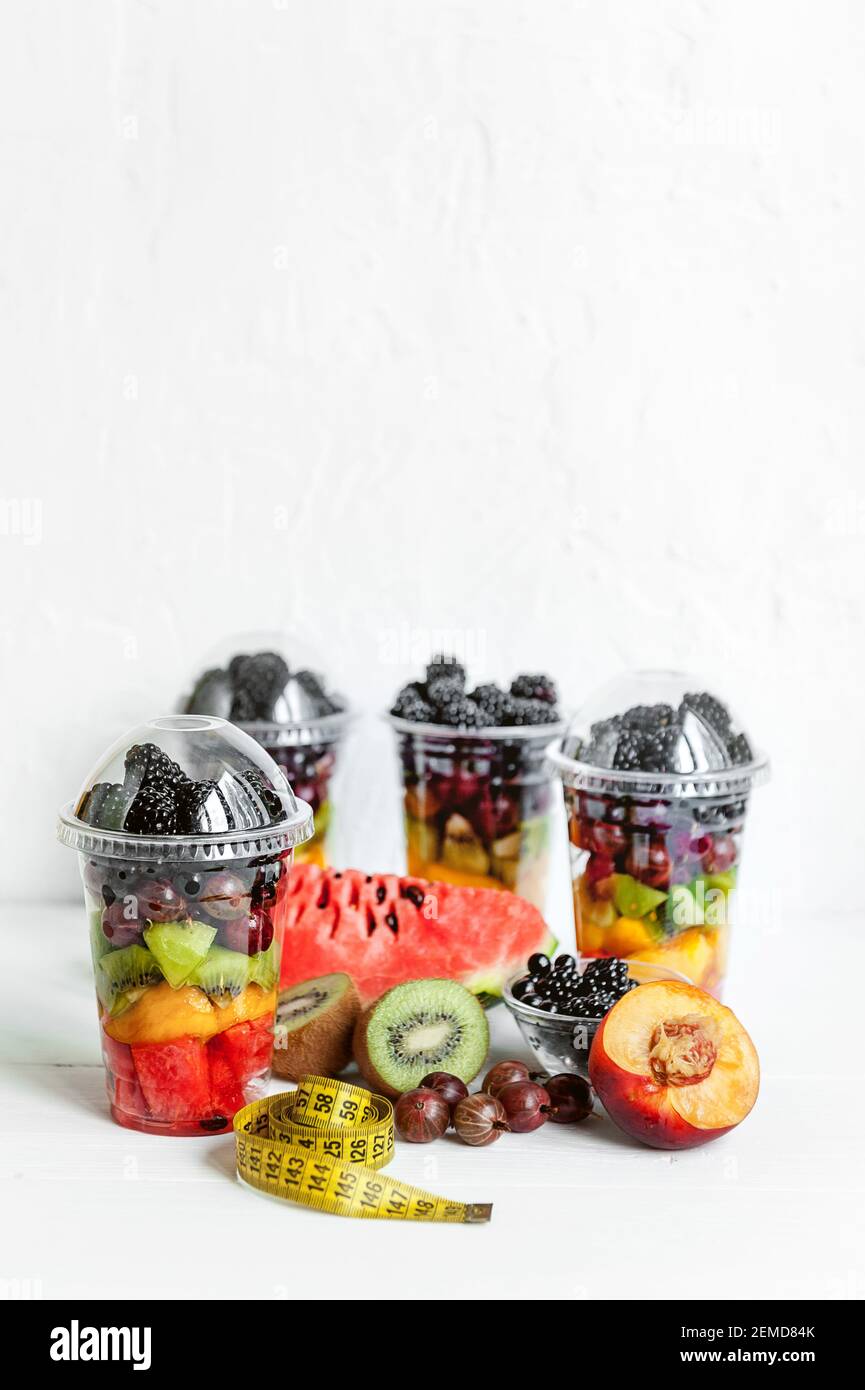 Fruit in a plastic cup Stock Photo - Alamy