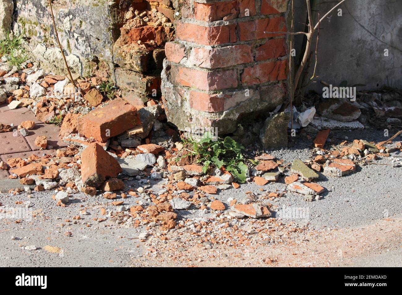 Cracked broken abandoned old suburban family house red brick wall ...