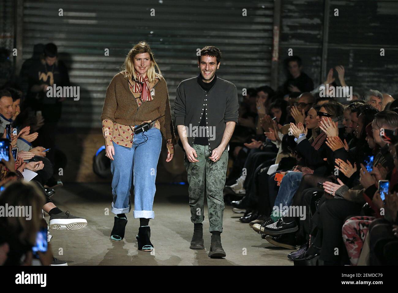 Zoe Latta and Mike Eckhaus walk on the runway during the Eckhaus Latta ...