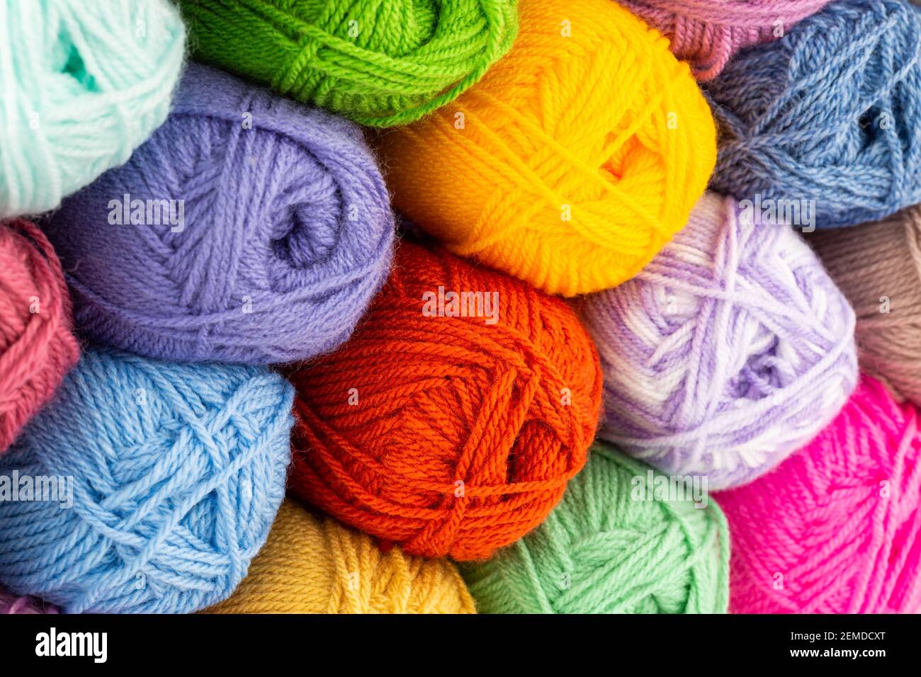 The stack of colorful knitting yarn clews close up picture Stock Photo ...