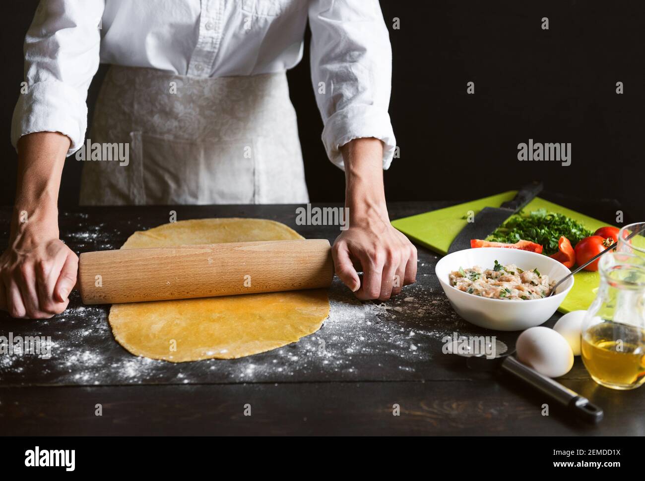 Woman chef cooks step by step the traditional ravioli Stock Photo - Alamy