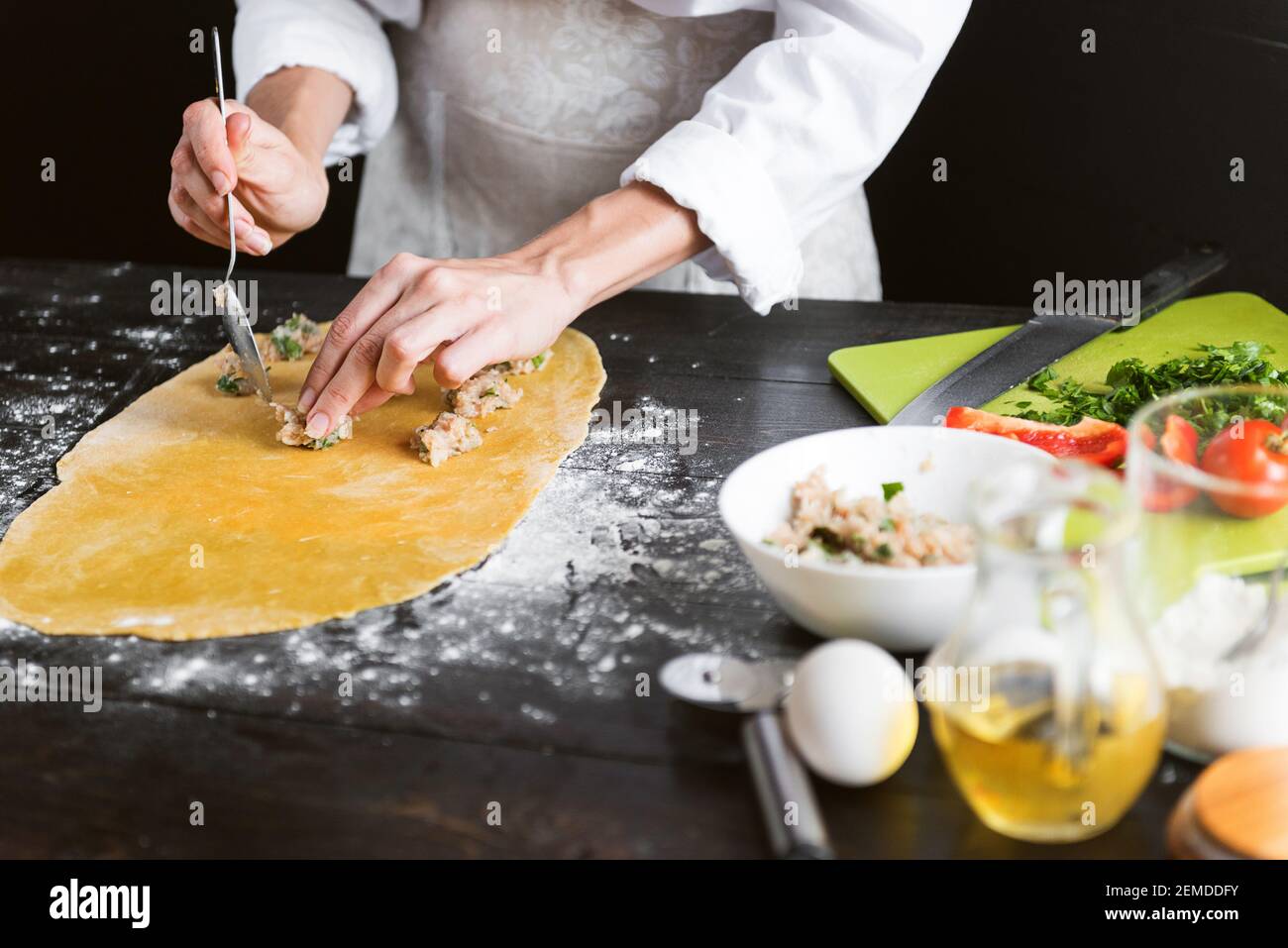Woman chef cooks step by step the traditional ravioli Stock Photo - Alamy