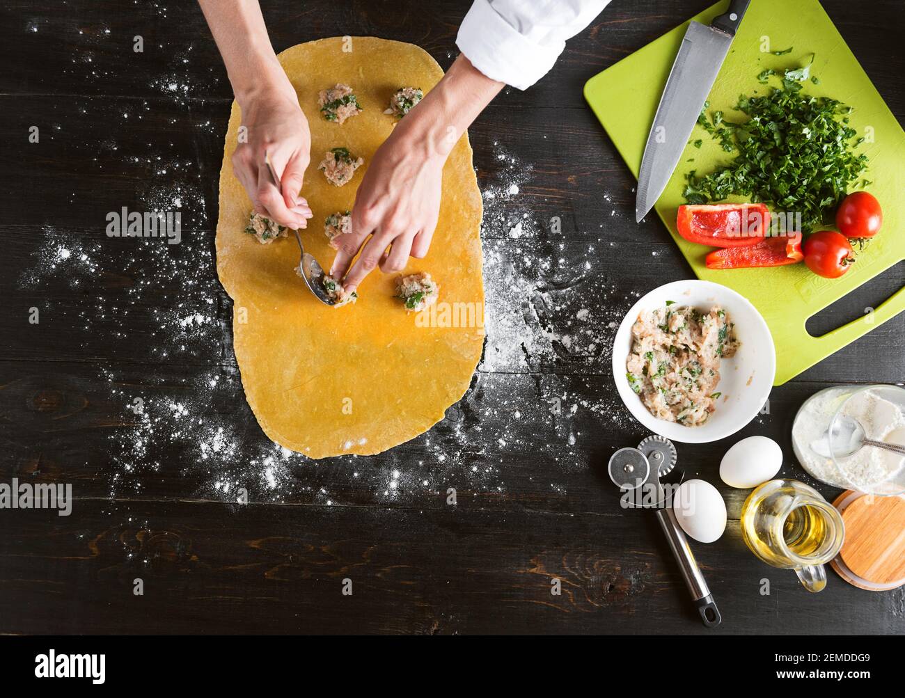 Woman chef cooks step by step the traditional ravioli Stock Photo - Alamy