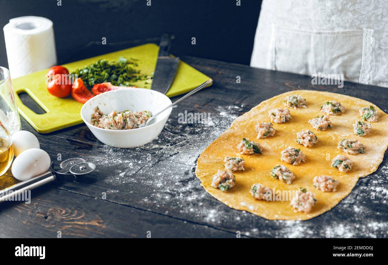 Woman chef cooks step by step the traditional ravioli Stock Photo - Alamy