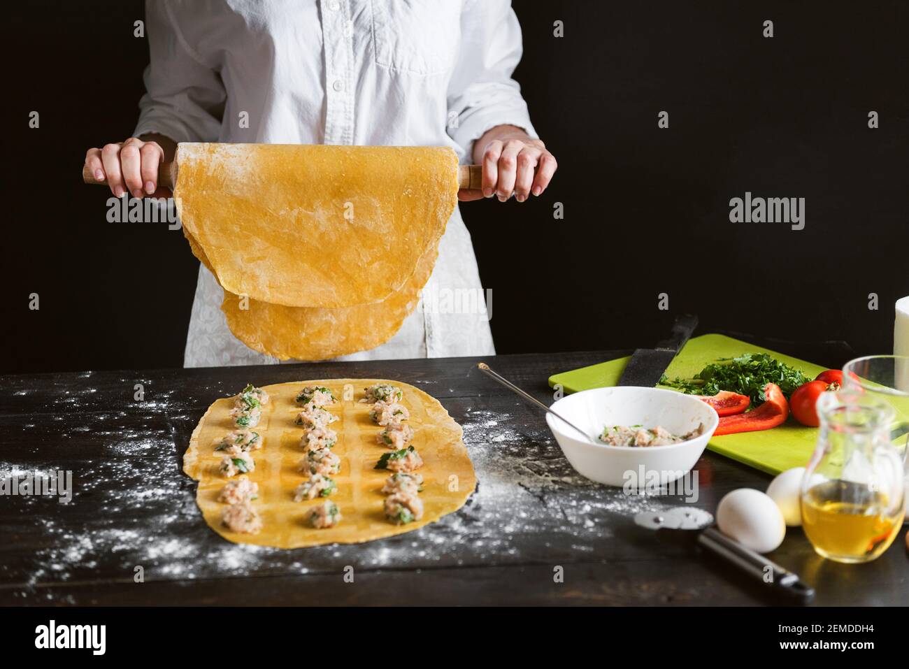 Woman chef cooks step by step the traditional ravioli Stock Photo - Alamy