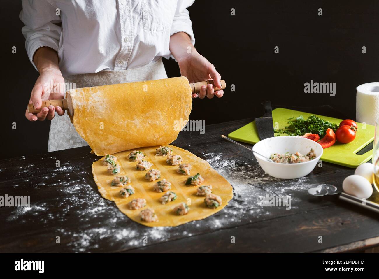 Woman chef cooks step by step the traditional ravioli Stock Photo - Alamy