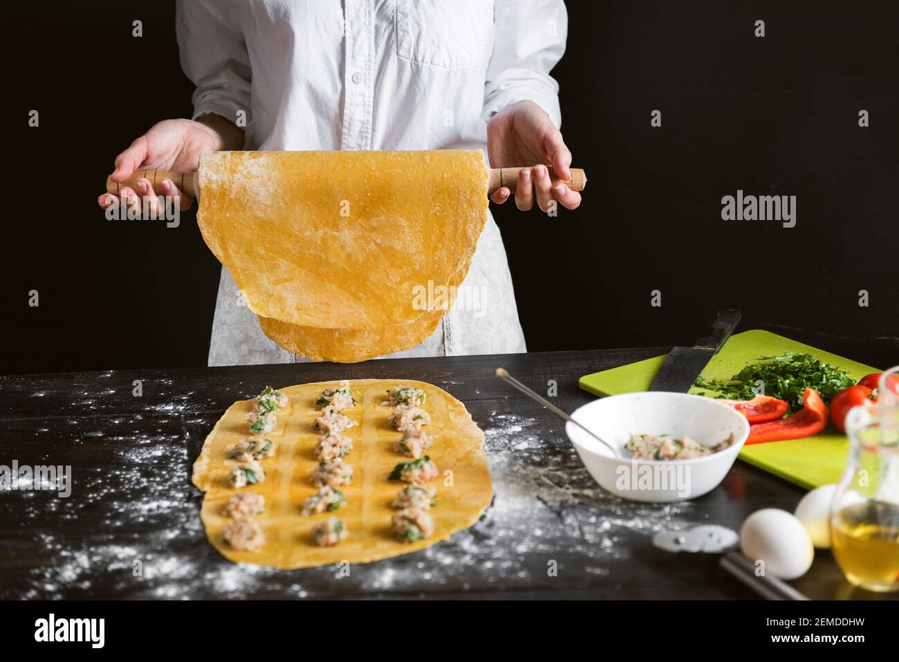 Woman chef cooks step by step the traditional ravioli Stock Photo - Alamy