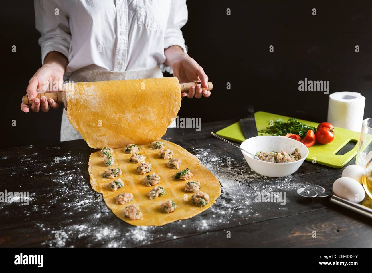 Woman chef cooks step by step the traditional ravioli Stock Photo - Alamy