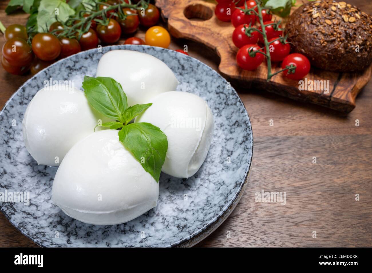 Cheese collection, white balls of soft Italian cheese mozzarella ...