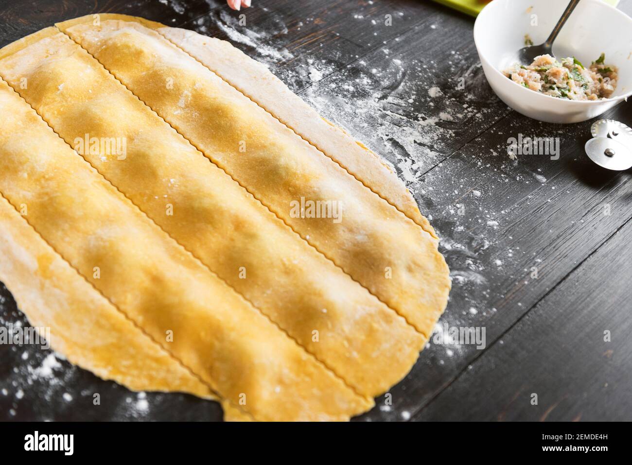 Woman chef cooks step by step the traditional ravioli Stock Photo - Alamy