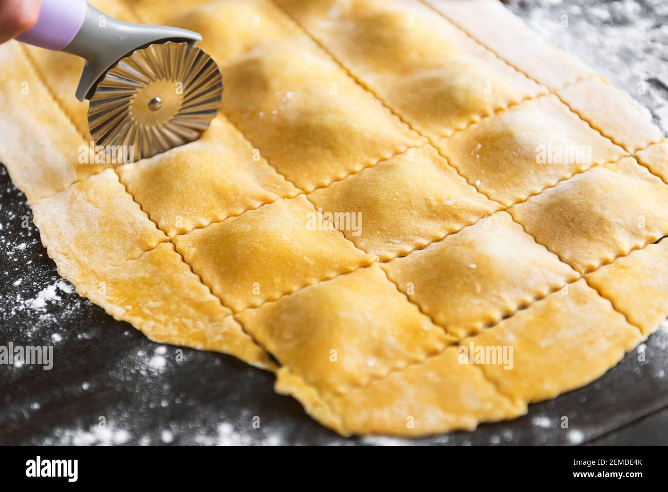Woman chef cooks step by step the traditional ravioli Stock Photo - Alamy