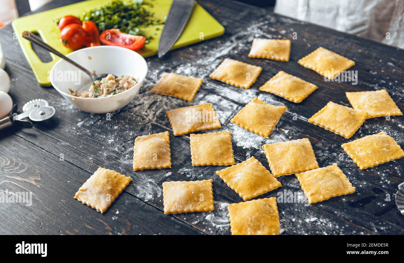 Woman chef cooks step by step the traditional ravioli Stock Photo - Alamy