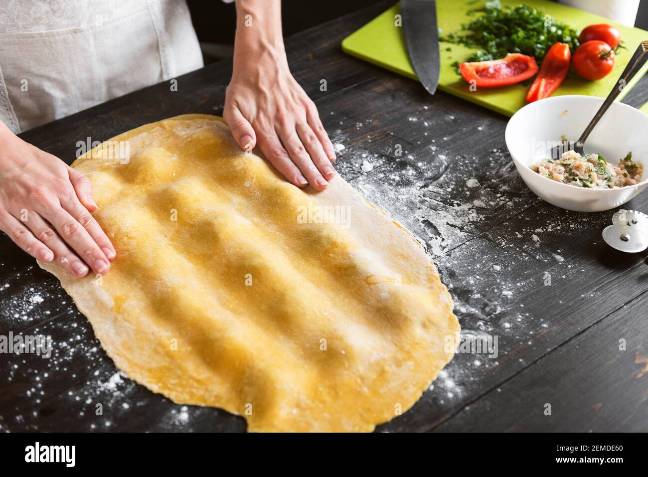 Woman chef cooks step by step the traditional ravioli Stock Photo - Alamy