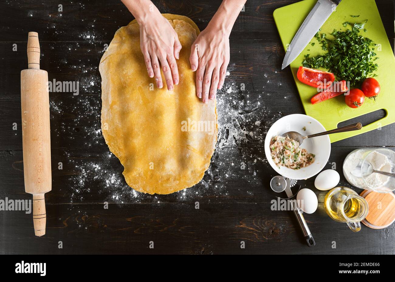 Woman chef cooks step by step the traditional ravioli Stock Photo - Alamy