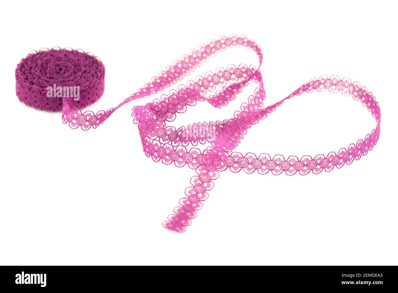 Pink lace tape isolated on white background Stock Photo - Alamy