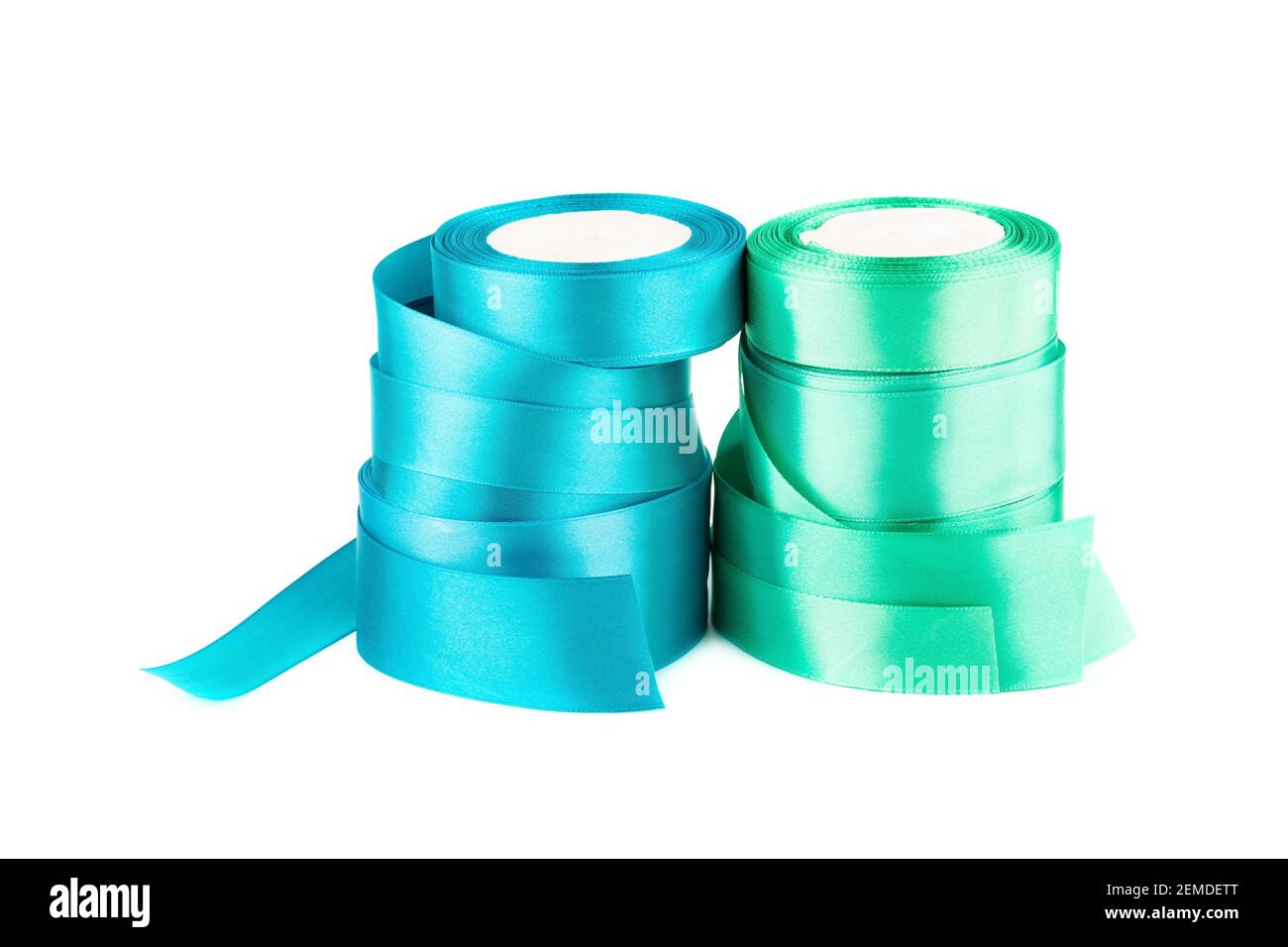 Green and blue silk ribbon reels isolated on white background Stock ...