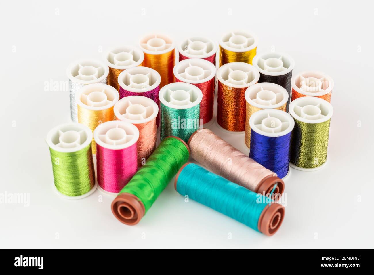 Colorful silk and cotton thread reels close up picture Stock Photo - Alamy