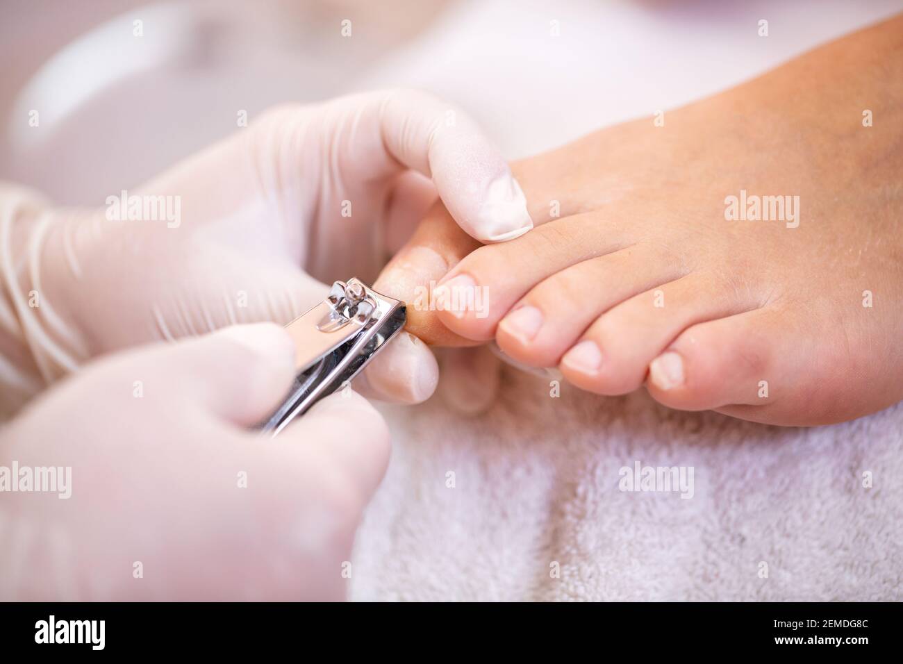 Cutting toe nails hi-res stock photography and images - Alamy