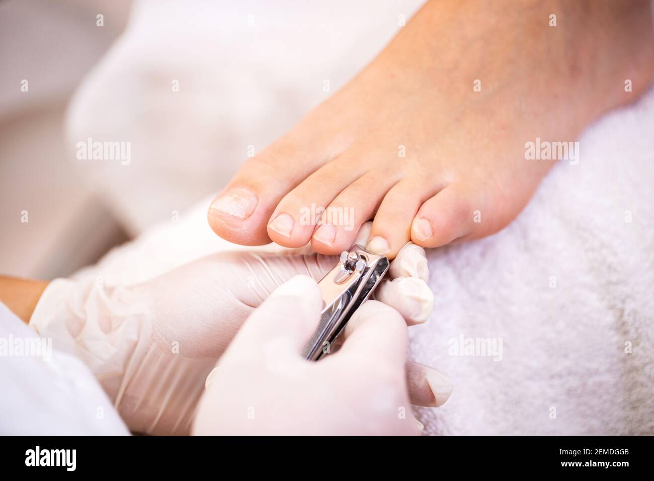 Clipping nails woman cutting toe hi-res stock photography and images ...