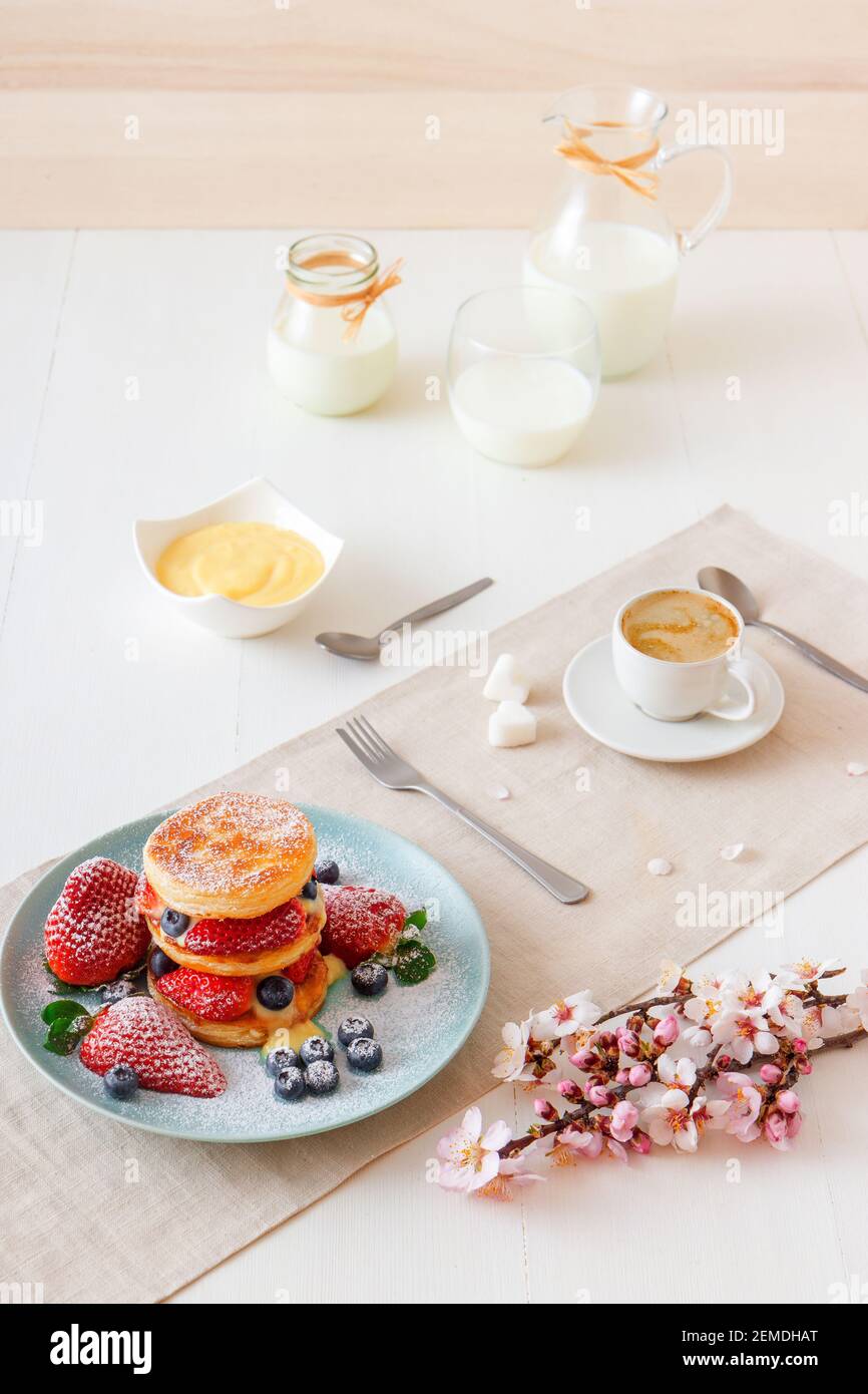 Mille Feuille, puff pastry discs with giant strawberries and ...