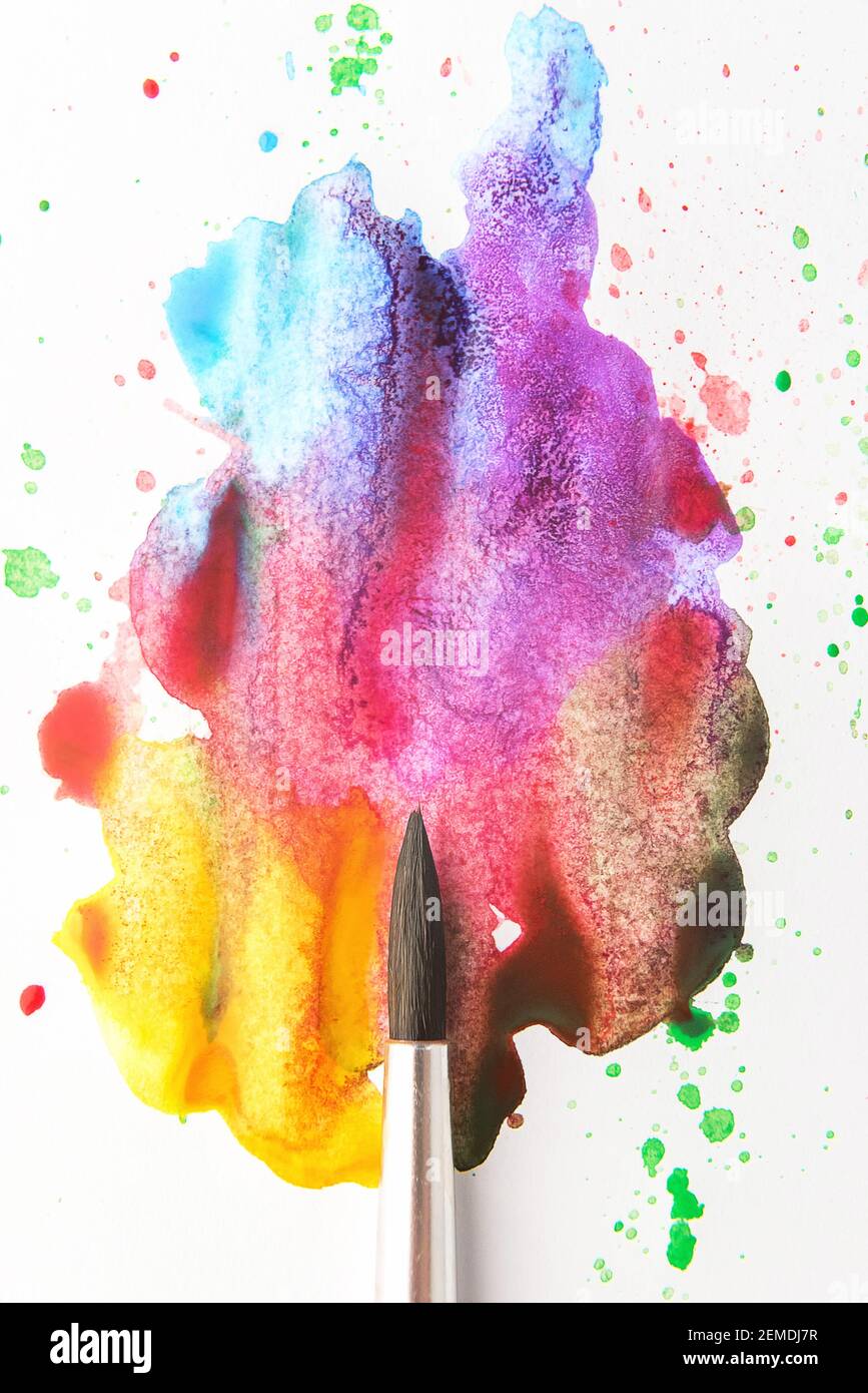 Artistic brush On a piece of paper Stock Photo - Alamy