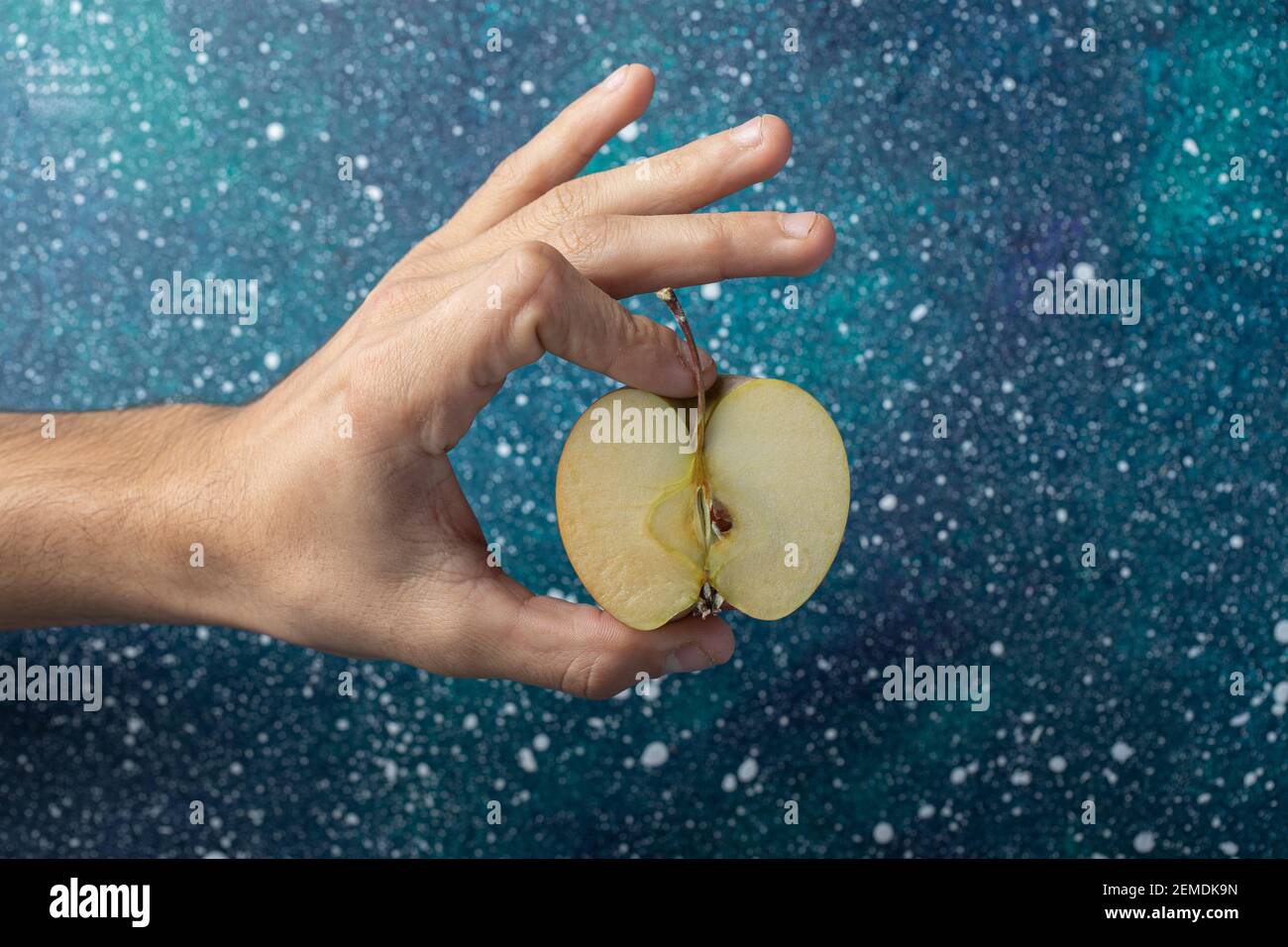Man hold apple hi-res stock photography and images - Alamy