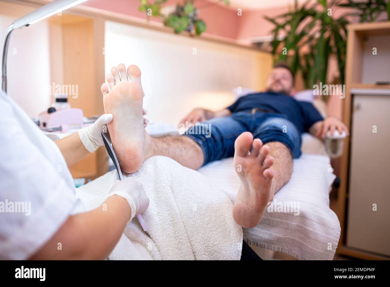 Foot pedicure for men, relaxing cosmetic pedicure treatment, clean and ...