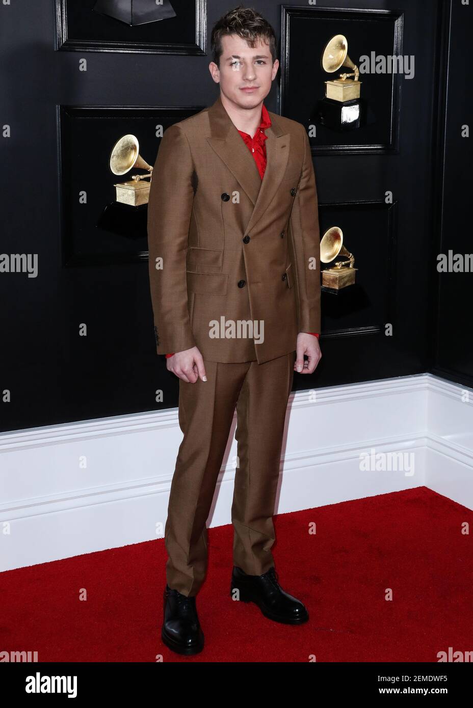 LOS ANGELES, CA, USA - FEBRUARY 10: Singer Charlie Puth wearing a Prada ...