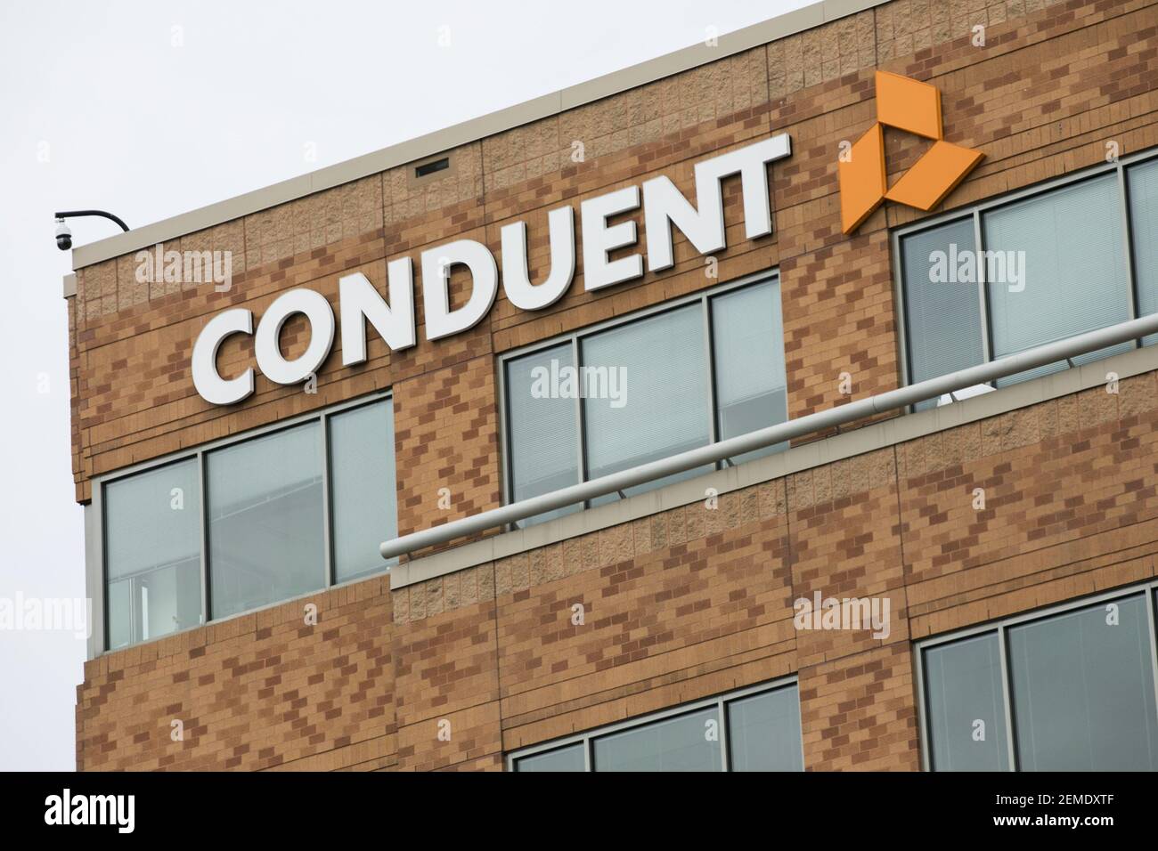 A logo sign outside of a facility occupied by Conduent in Germantown ...