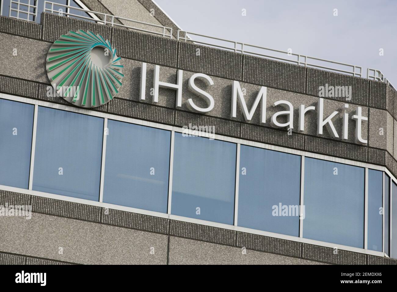 A logo sign outside of a facility occupied by IHS Markit in ...