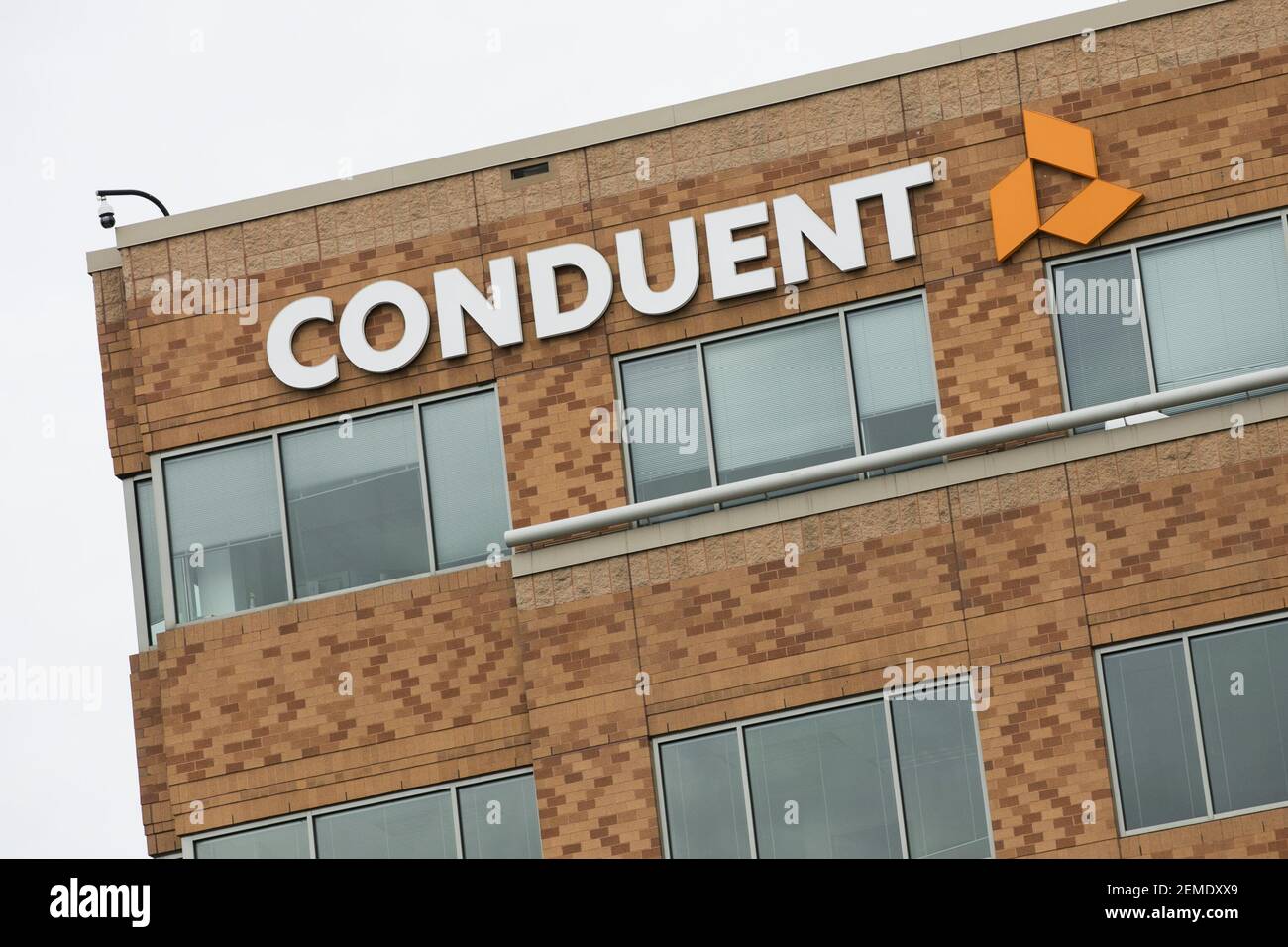 A logo sign outside of a facility occupied by Conduent in Germantown ...