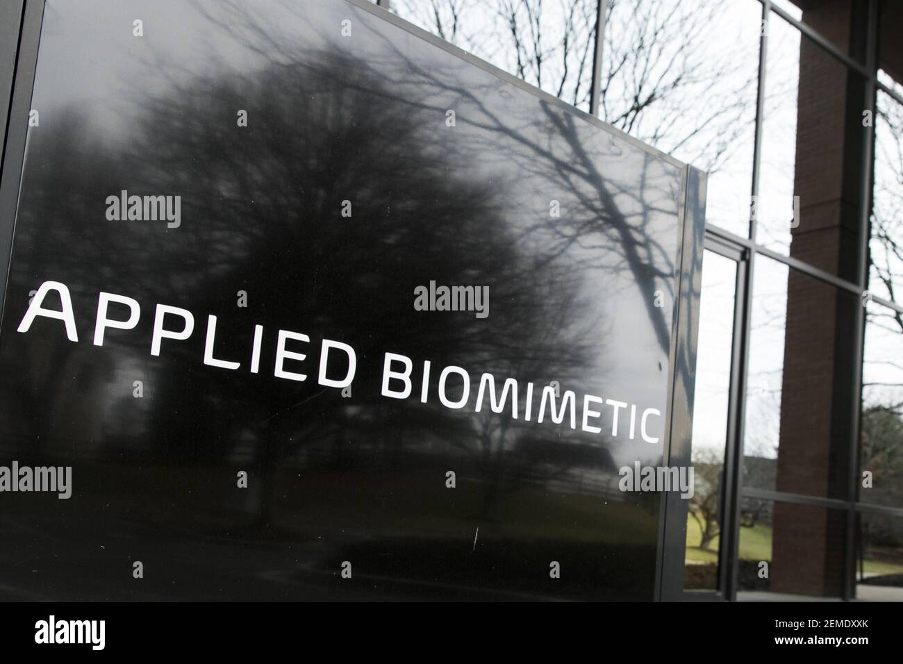 A logo sign outside of the headquarters of Applied Biomimetic in ...