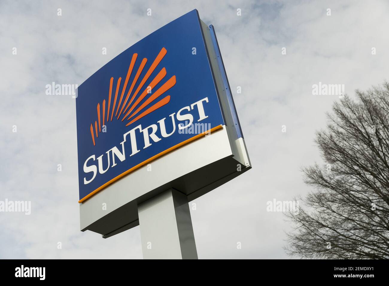 A logo sign outside of a SunTrust Bank branch in Gaithersburg, Maryland ...