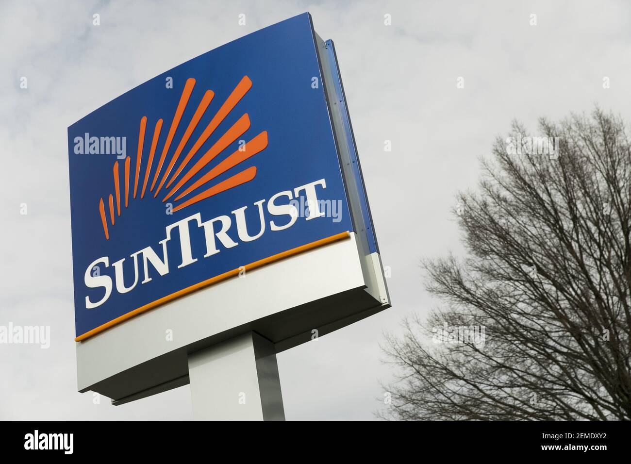 A logo sign outside of a SunTrust Bank branch in Gaithersburg, Maryland ...