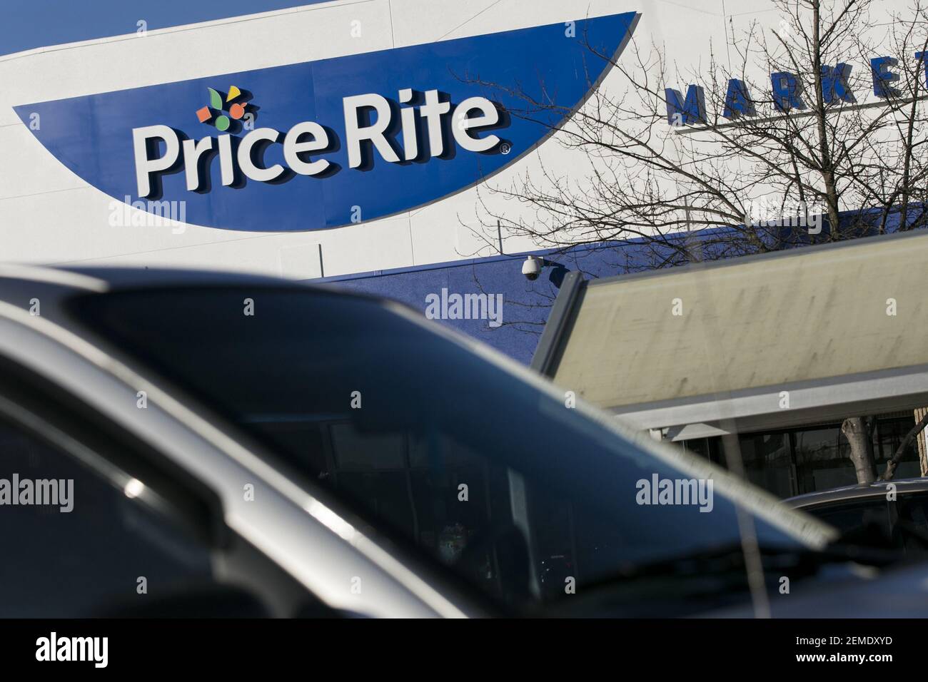 A logo sign outside of a Price Rite retail grocery store location in ...