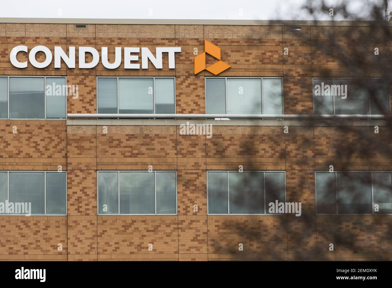 A logo sign outside of a facility occupied by Conduent in Germantown ...