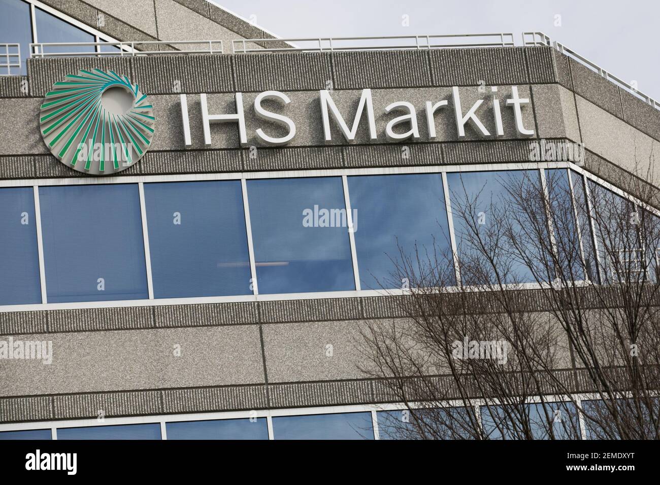 A logo sign outside of a facility occupied by IHS Markit in ...