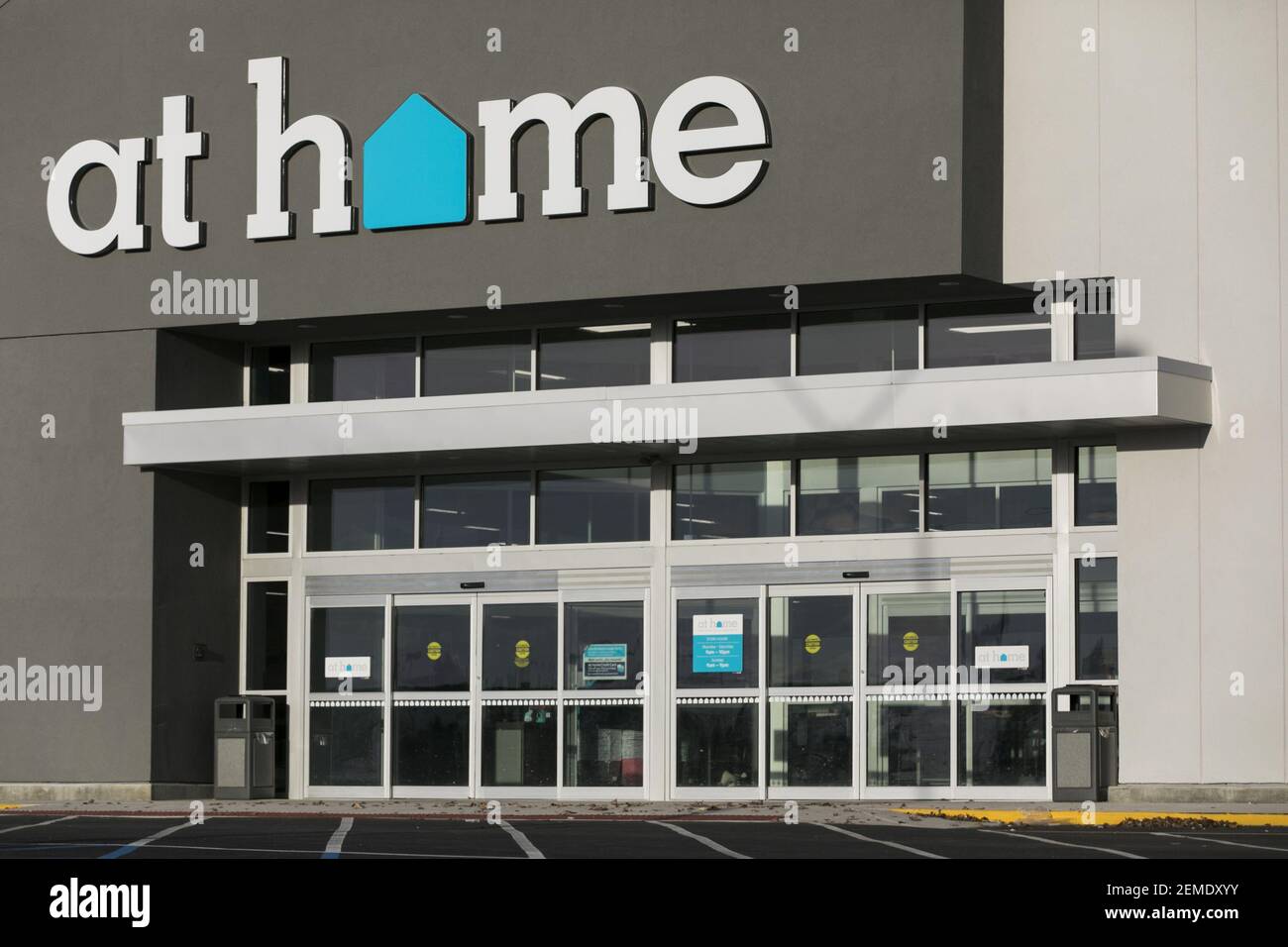 A logo sign outside of a At Home retail store location in Harrisburg ...